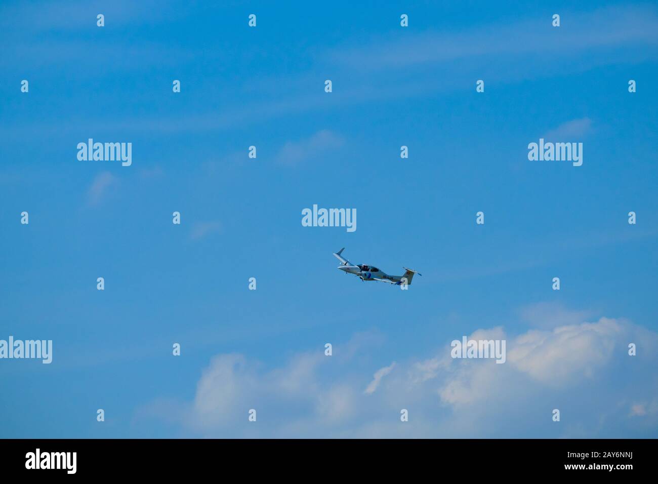 Private small air jet flying in the sky Stock Photo - Alamy