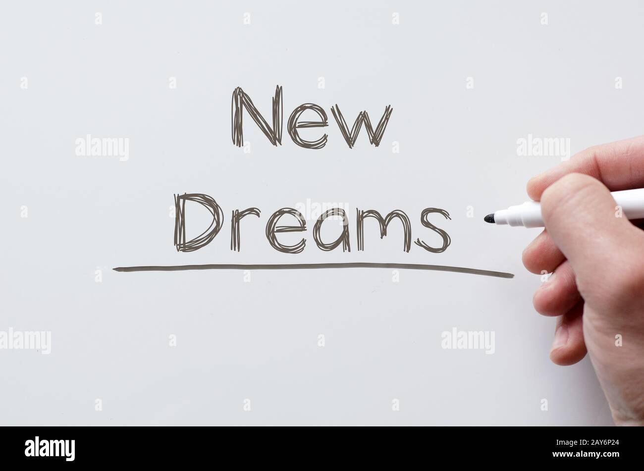 New dreams written on whiteboard Stock Photo - Alamy