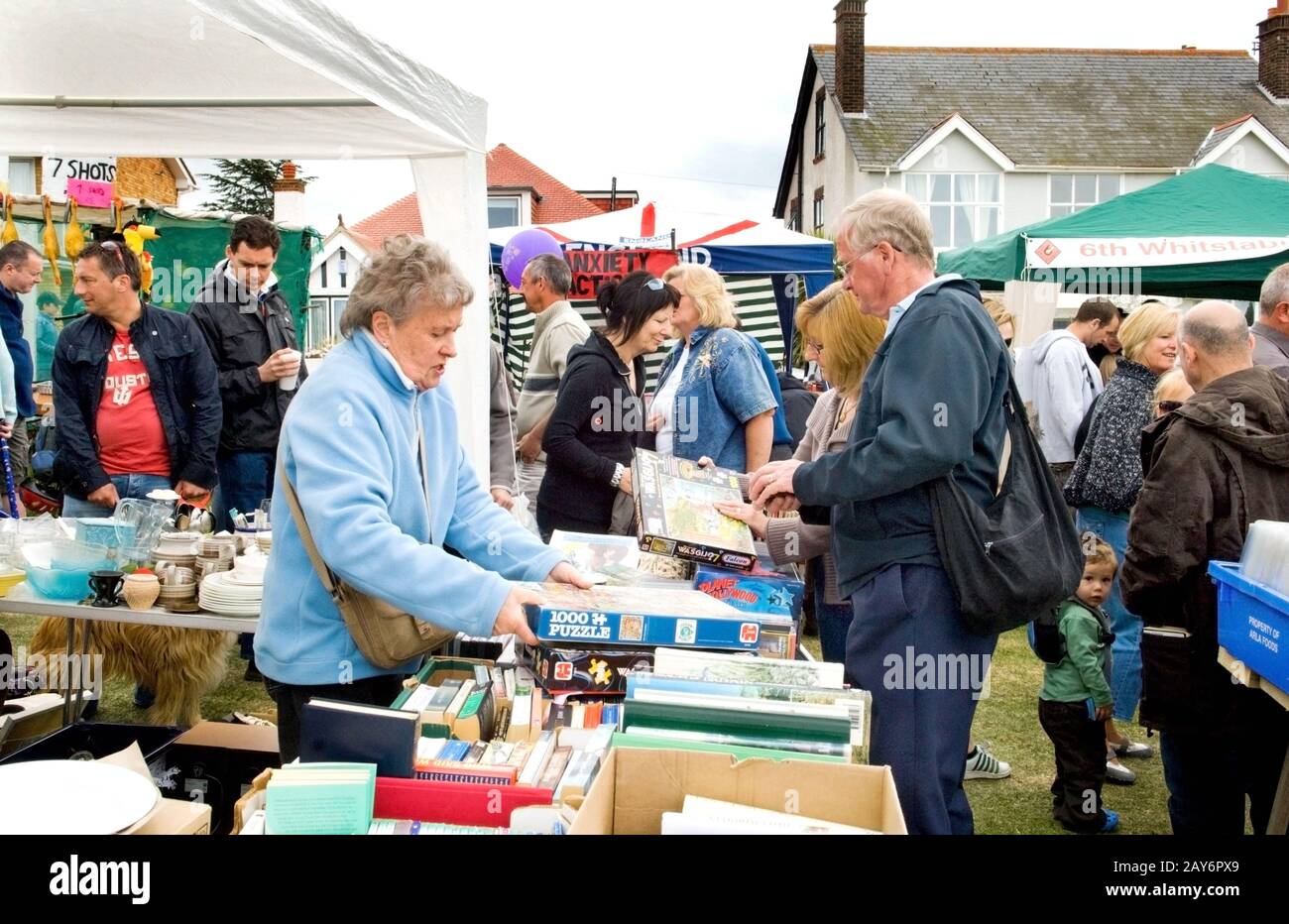 Book and game stall at a local fete Stock Photo - Alamy