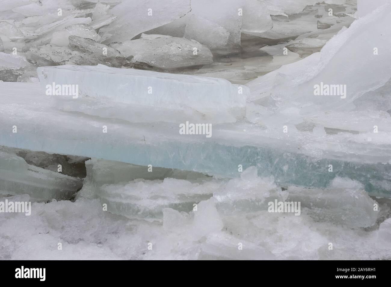 melting of ice blocks in the river water Stock Photo - Alamy
