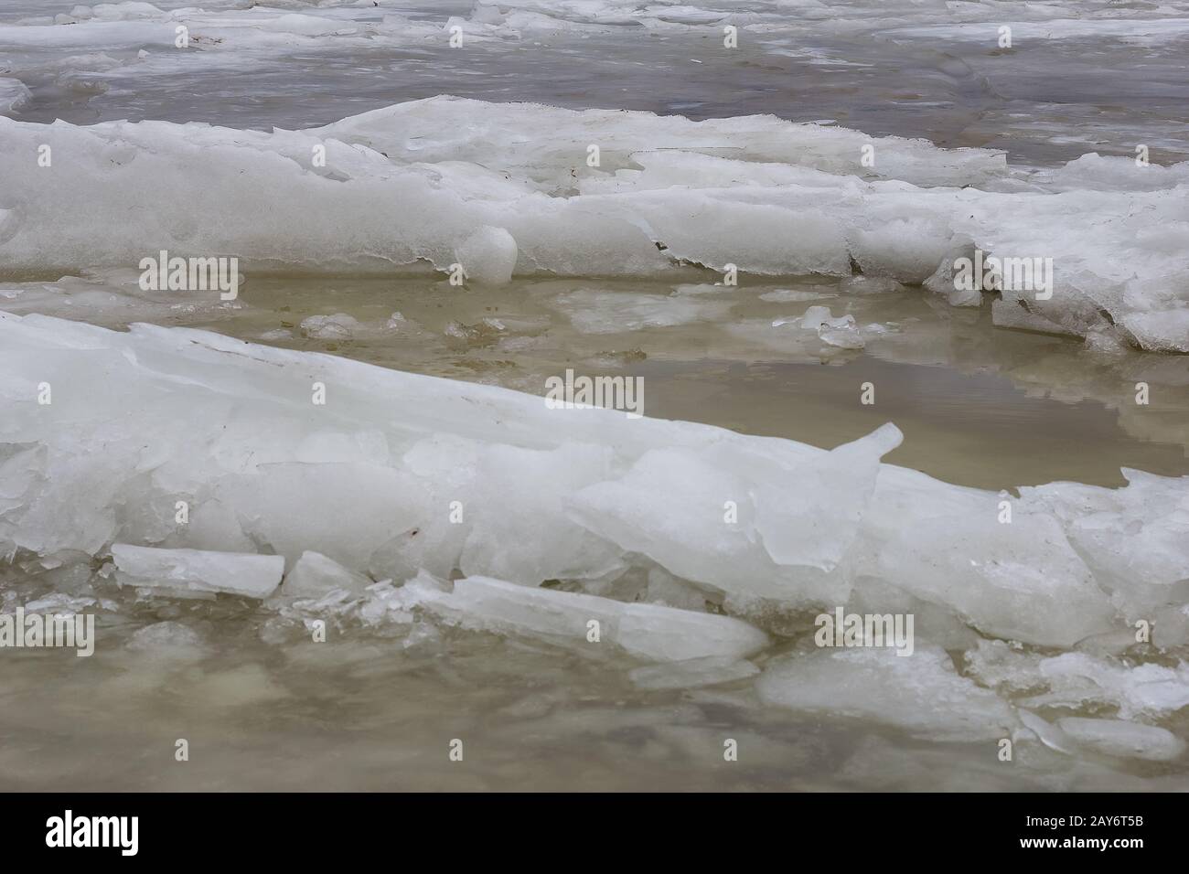 melting of ice blocks in the river water Stock Photo - Alamy