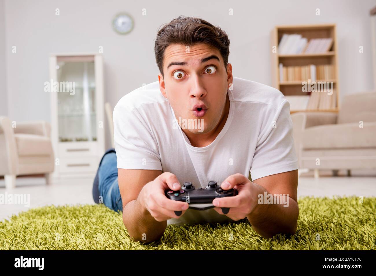 Man addicted to computer games Stock Photo - Alamy
