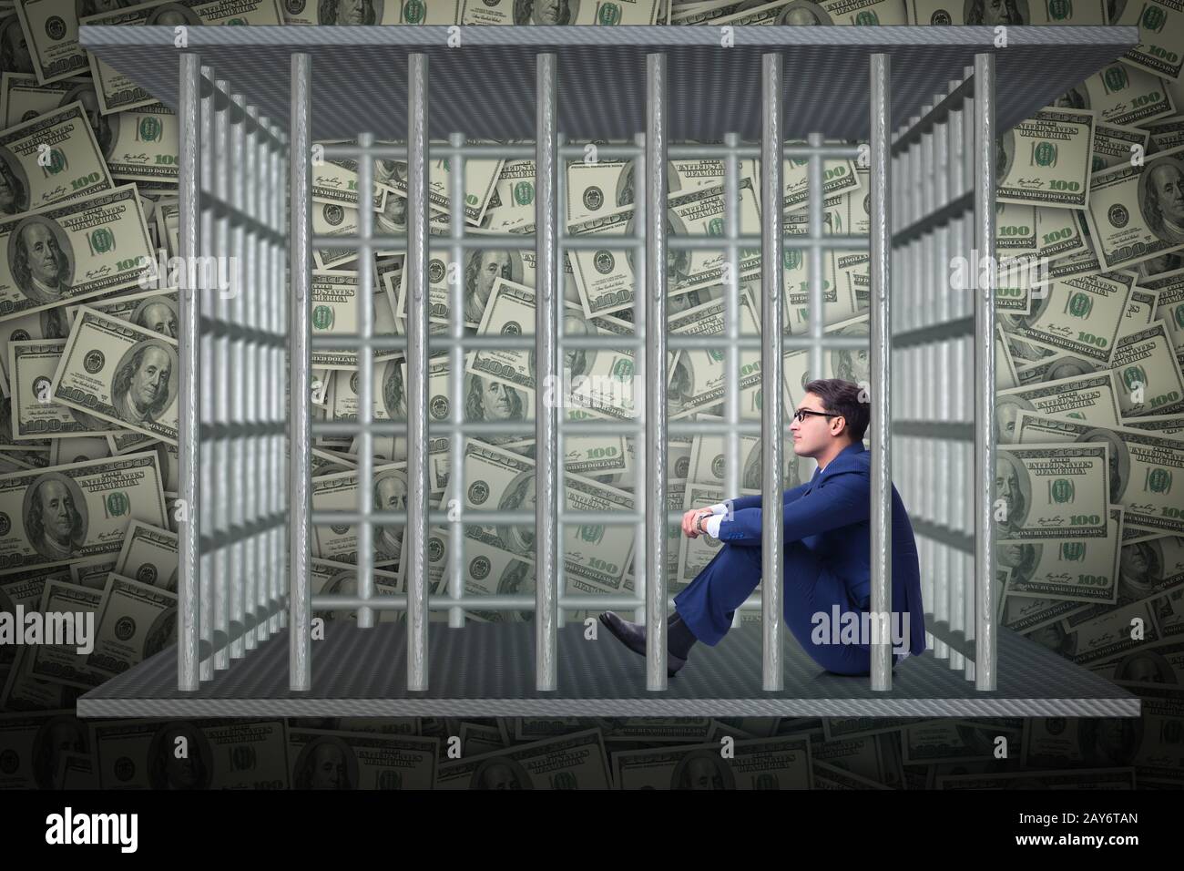 Man trapped in prison with dollars Stock Photo - Alamy