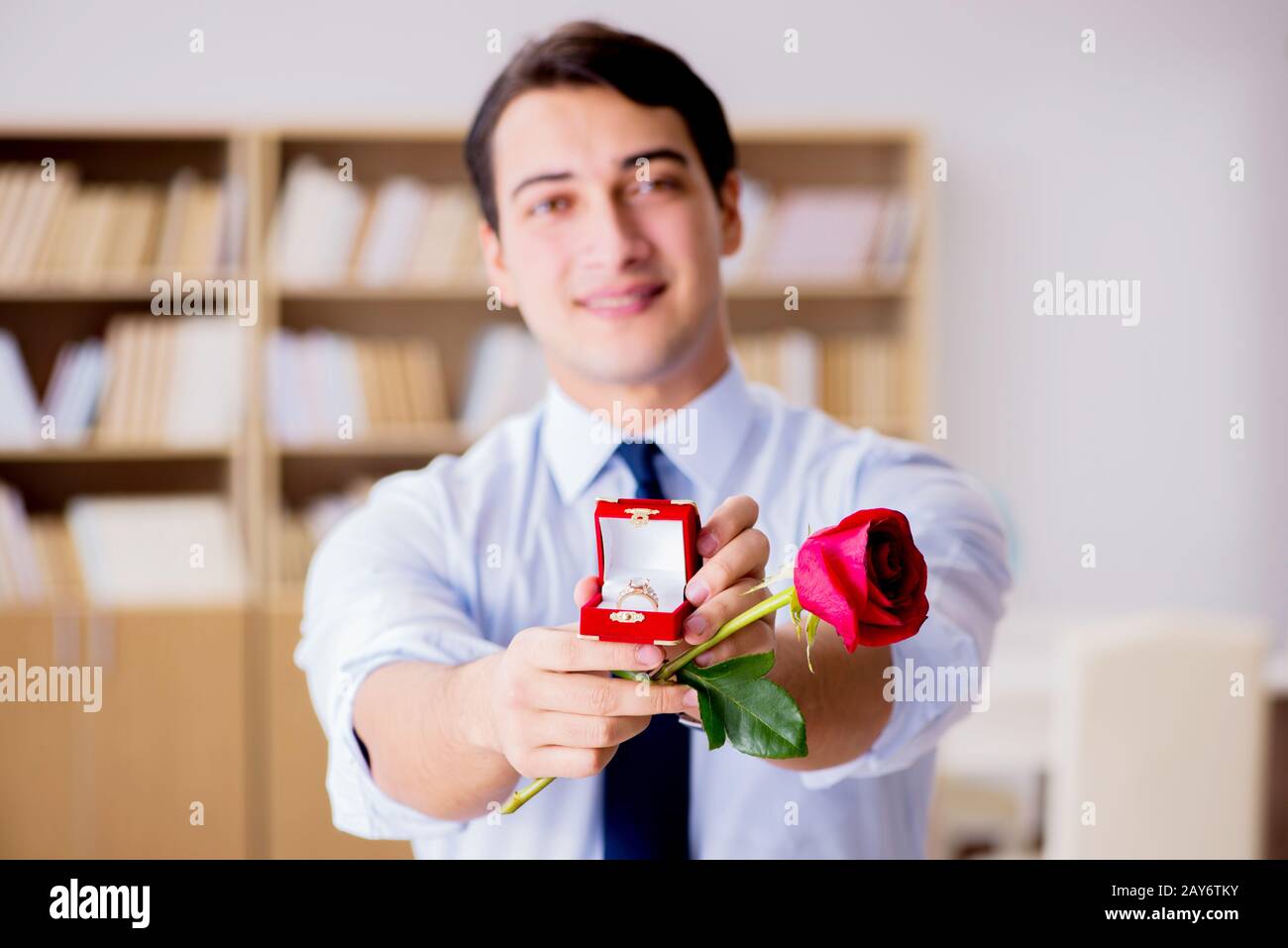 Romantic concept with man making marriage proposal Stock Photo - Alamy