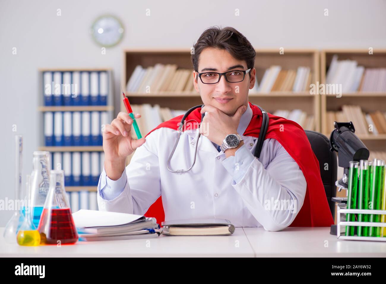 Superhero doctor working in the lab hospital Stock Photo - Alamy