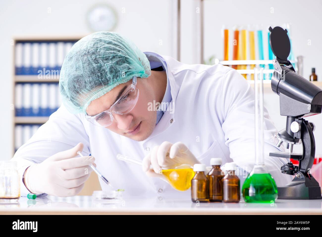 Pharmaceutical industry concept with scientist in the lab Stock Photo ...