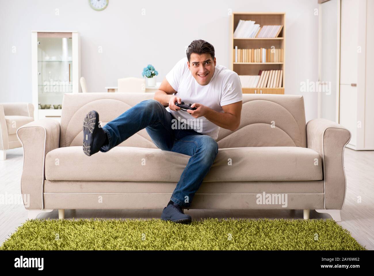 Man addicted to computer games Stock Photo - Alamy