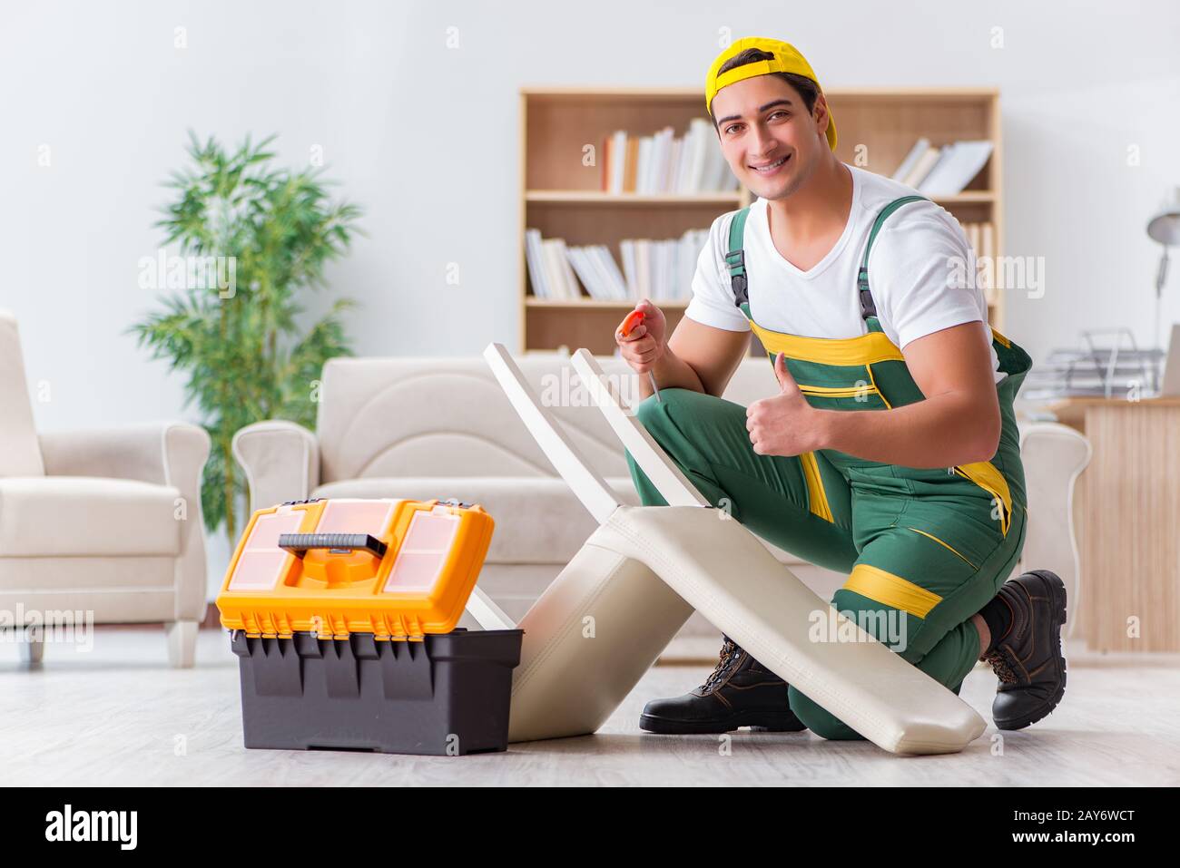 Worker repairing armchair hi-res stock photography and images - Alamy