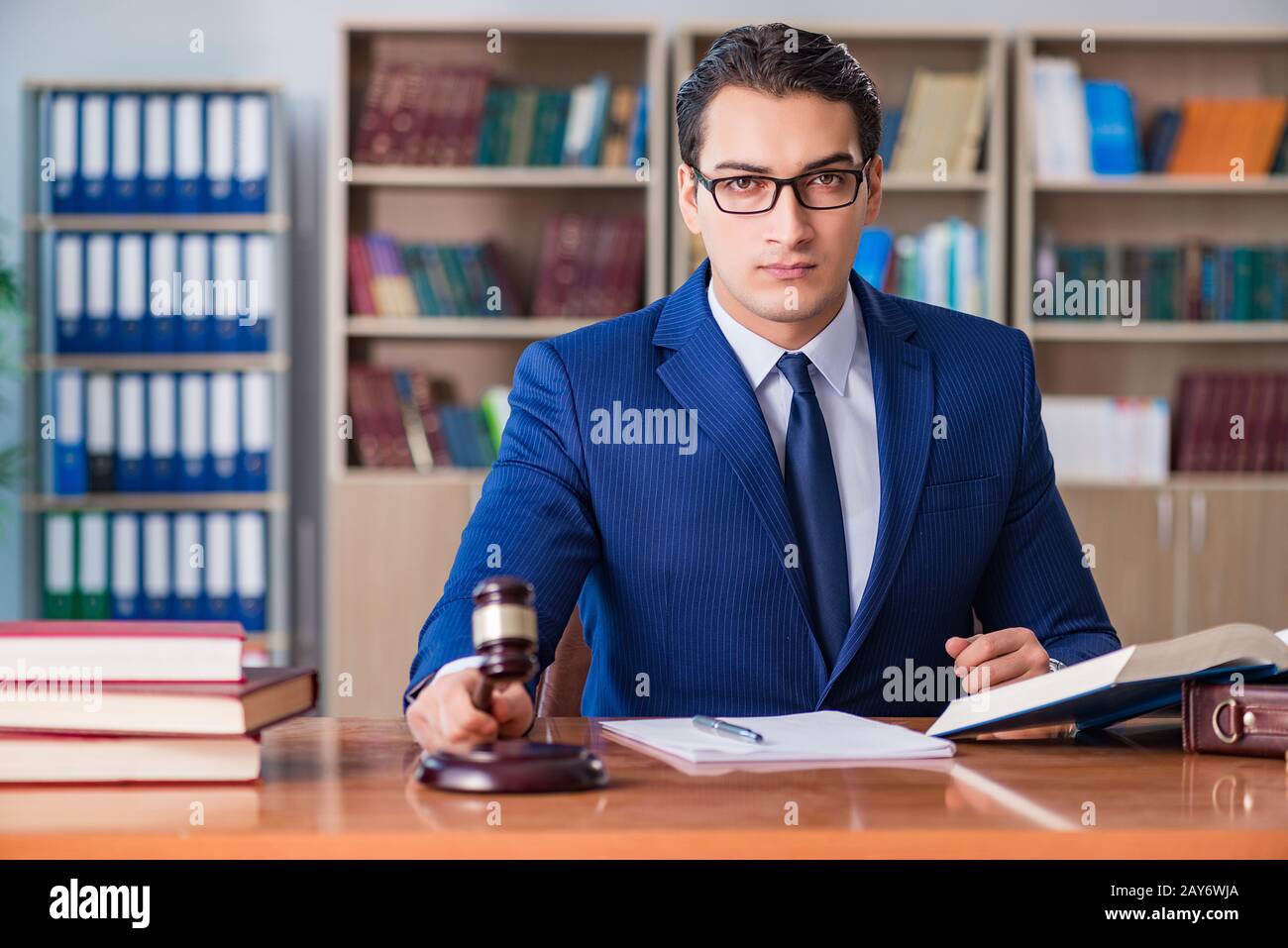 Judge gavel gown hand hi-res stock photography and images - Alamy