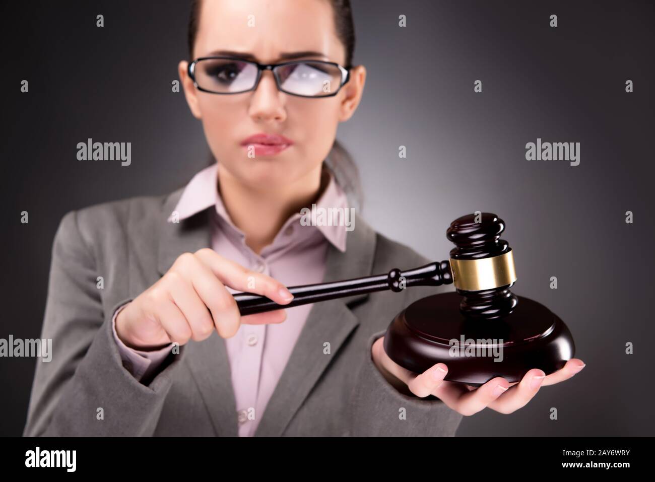 Woman judge with gavel in justice concept Stock Photo - Alamy