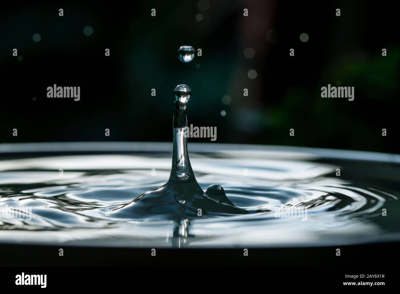 Water Drop splash with sun Stock Photo - Alamy