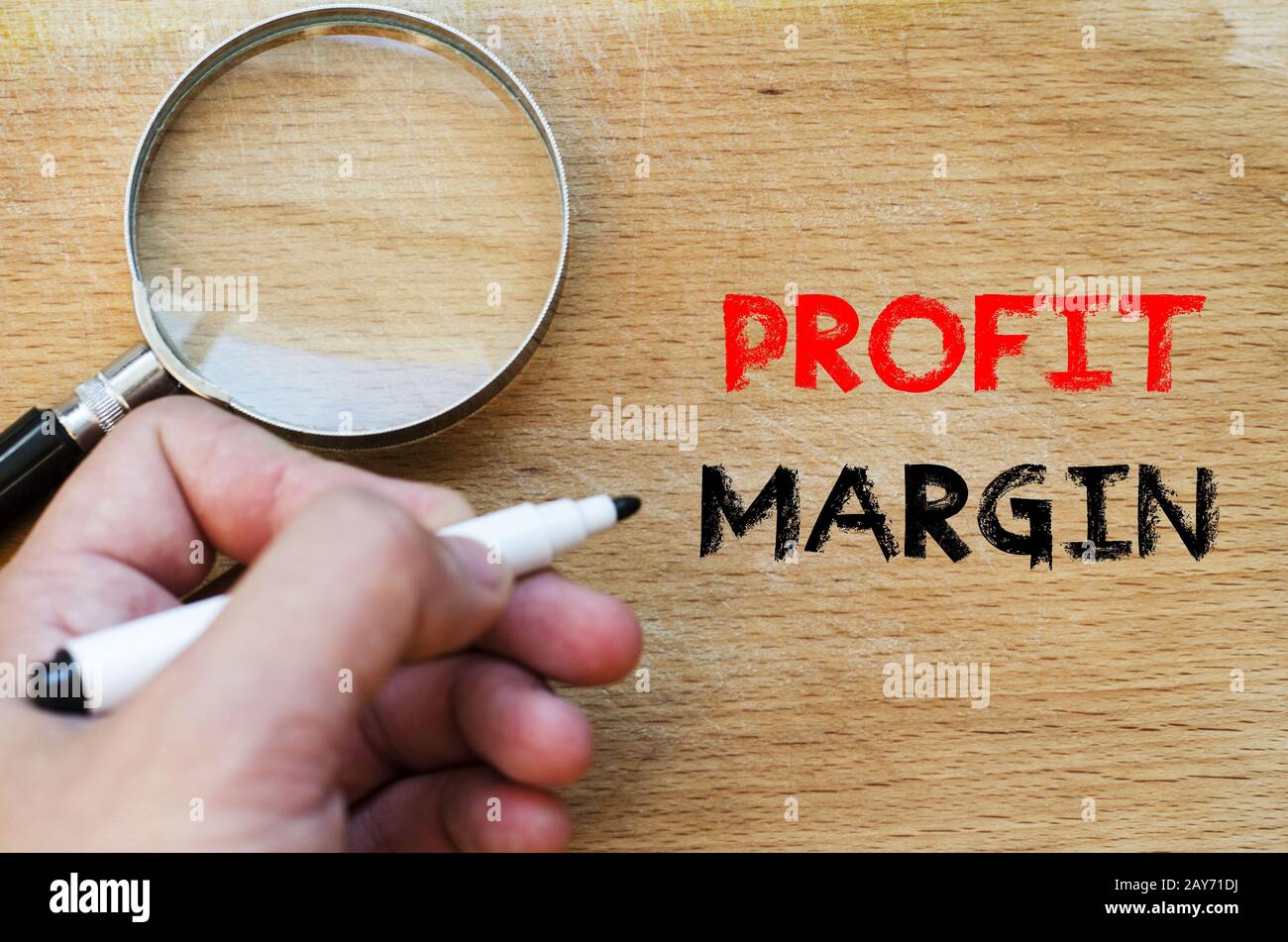 Profit margin text concept Stock Photo - Alamy