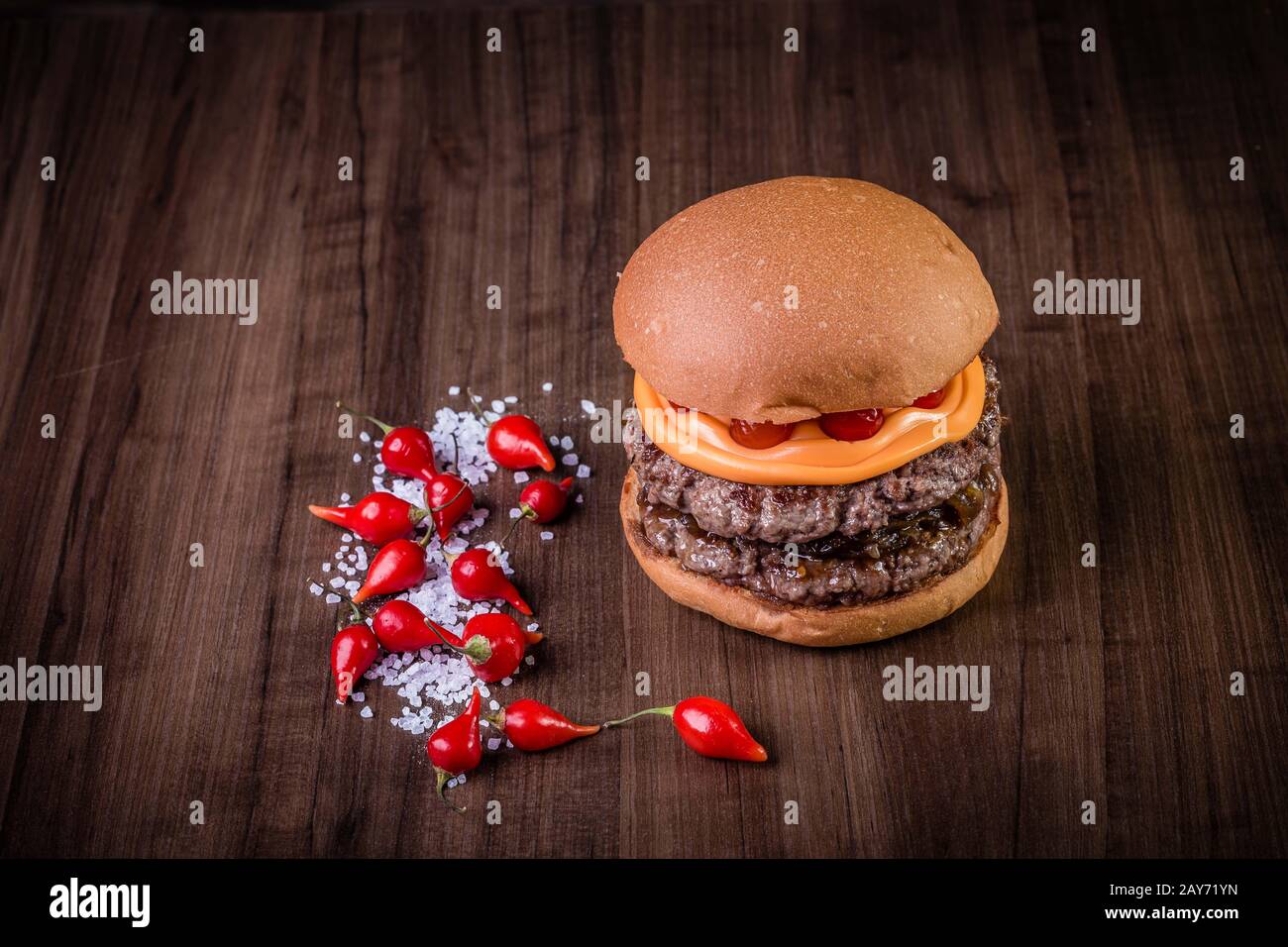 Double craft beef burger with cheddar cheese, caramelized onion and ...