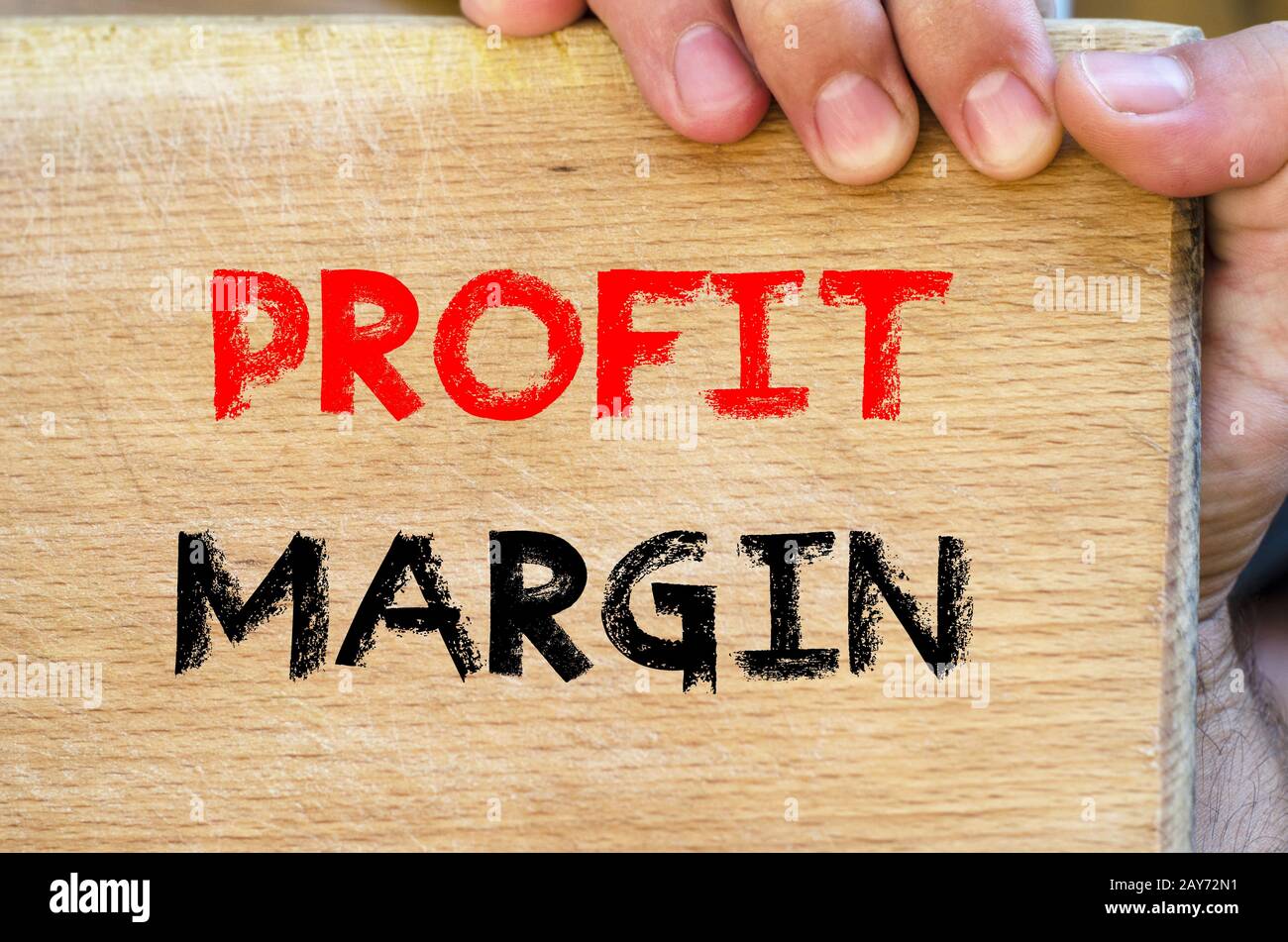 Profit margin text concept Stock Photo - Alamy