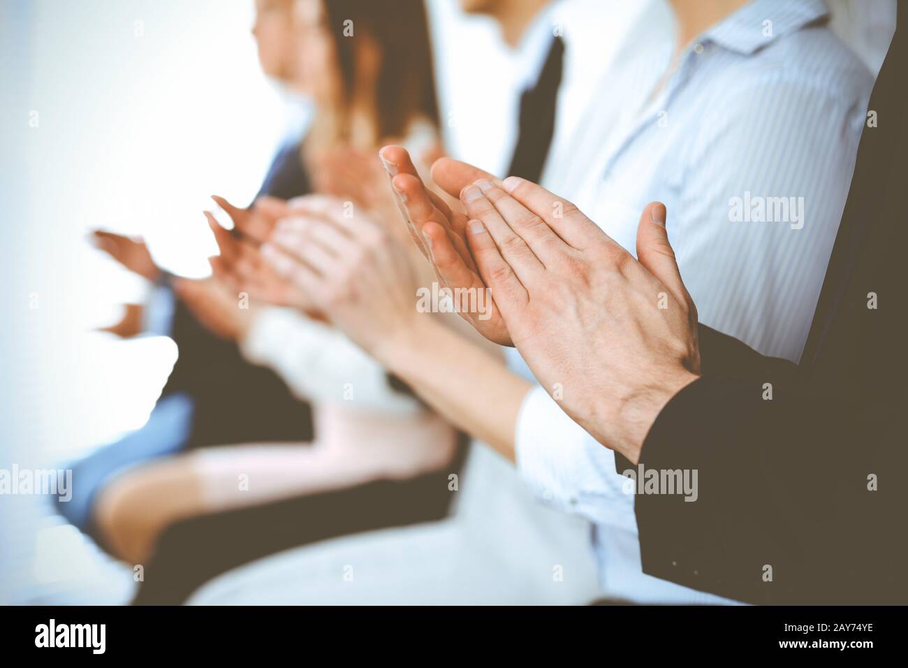 Business people clapping and applause at meeting or conference, close ...