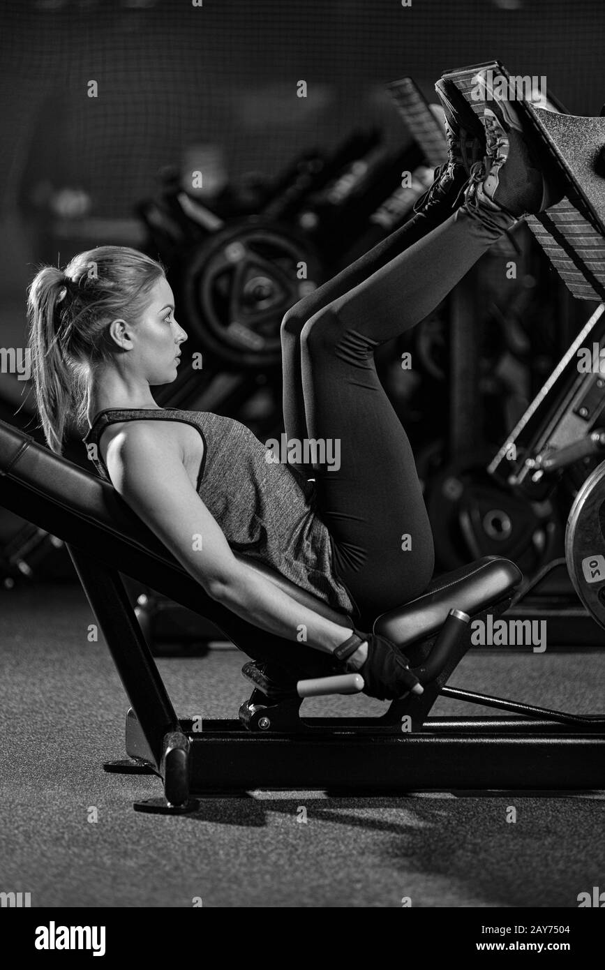 Leg press woman Black and White Stock Photos & Images - Alamy