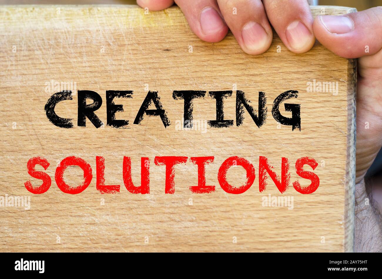 Creating solutions text concept Stock Photo - Alamy
