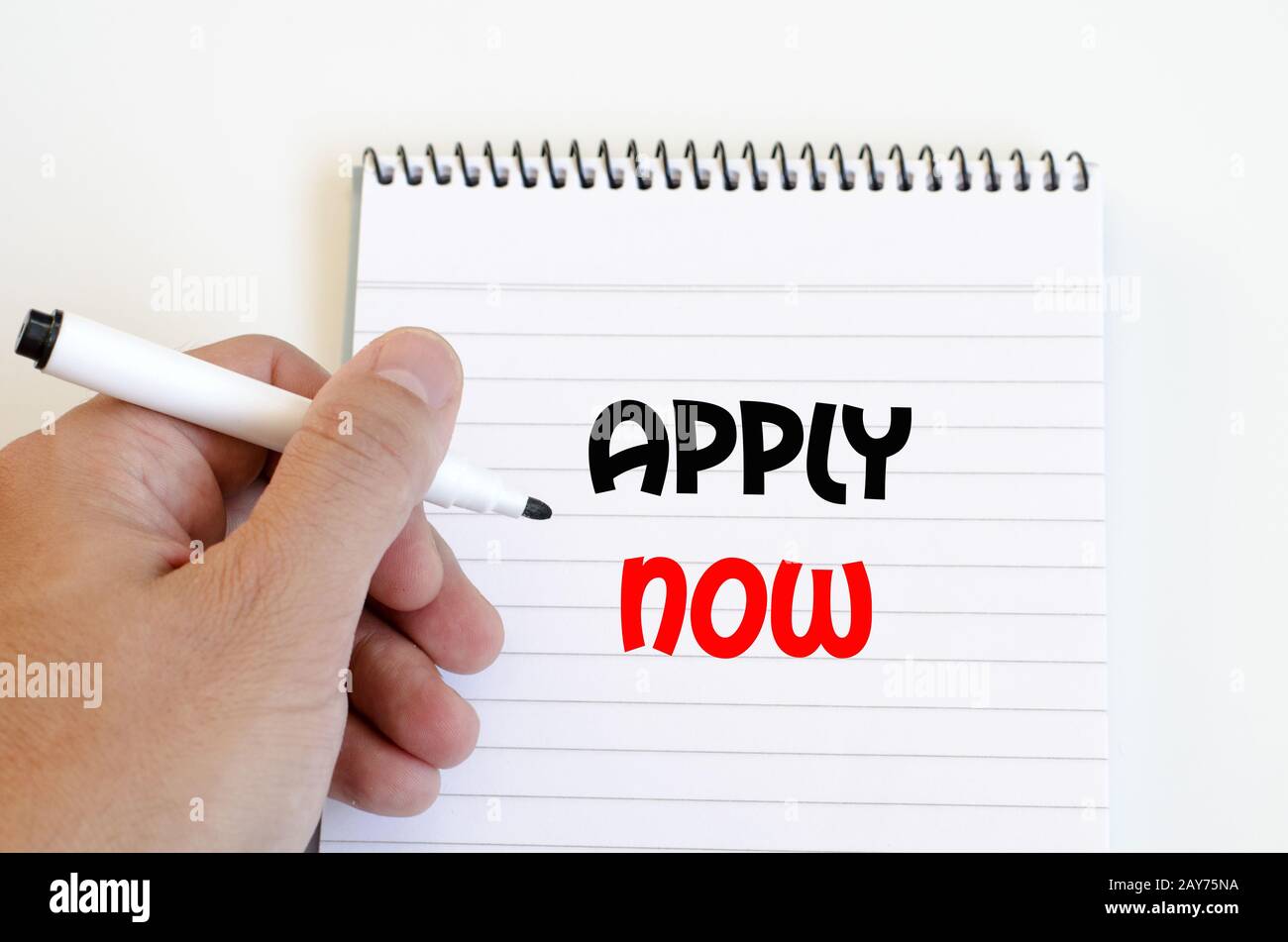 Apply now text concept Stock Photo - Alamy