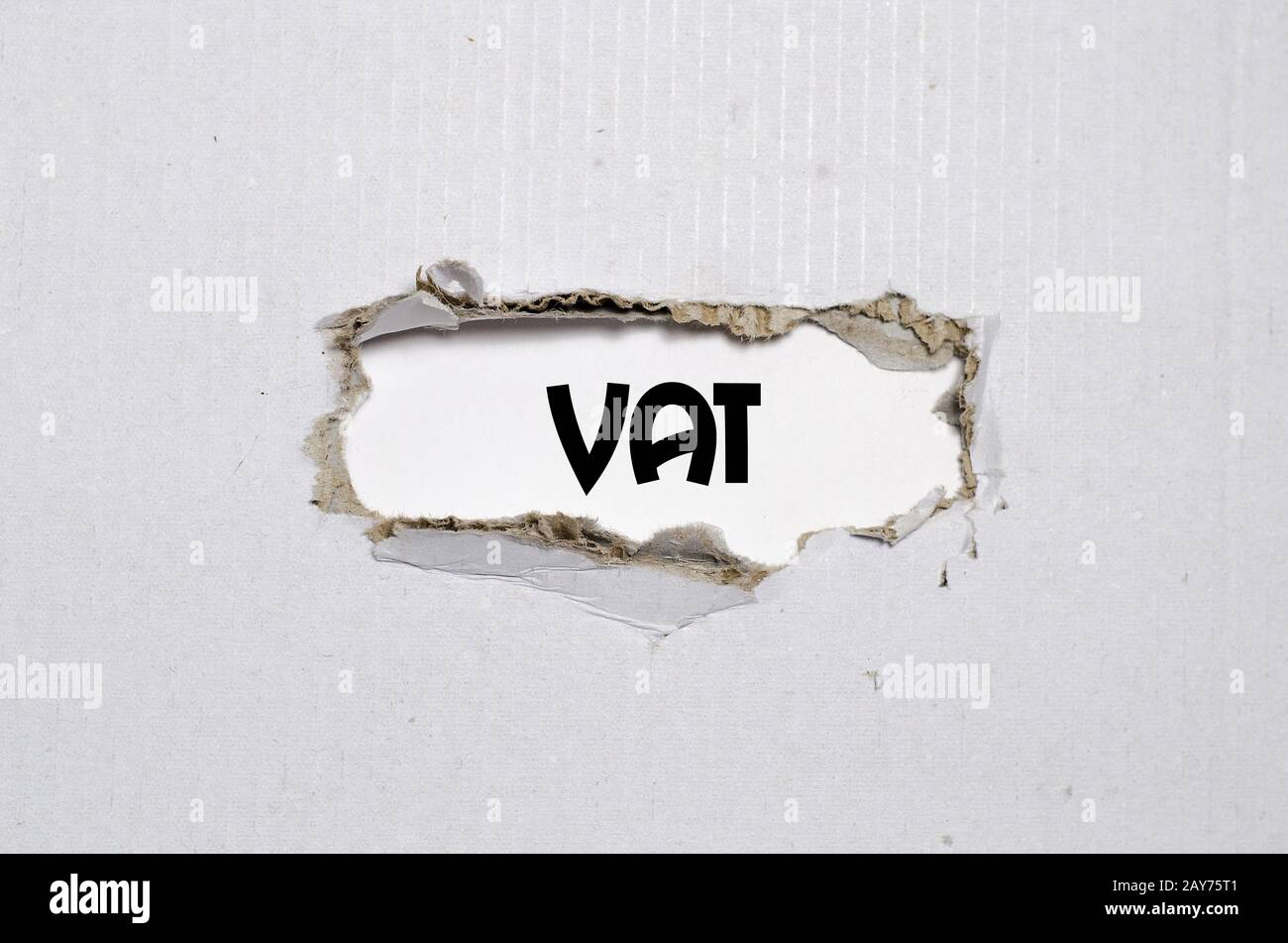 The word vat appearing behind torn paper Stock Photo - Alamy
