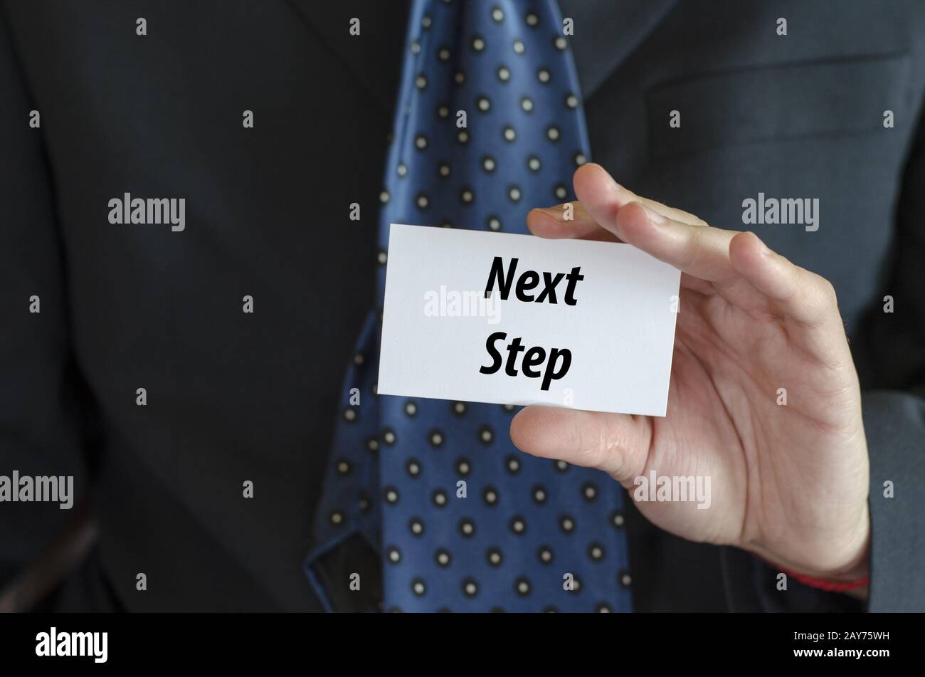 Next step text concept Stock Photo - Alamy
