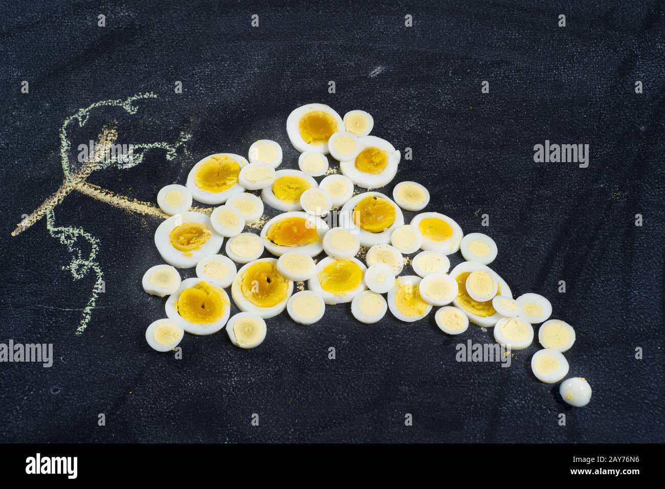 Genetic transformations grapes with egg Stock Photo - Alamy