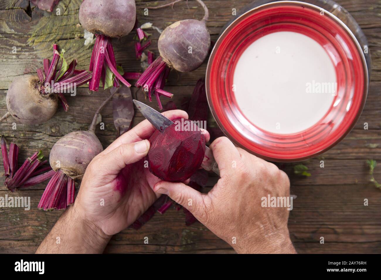 Peel the beetroot Stock Photo - Alamy