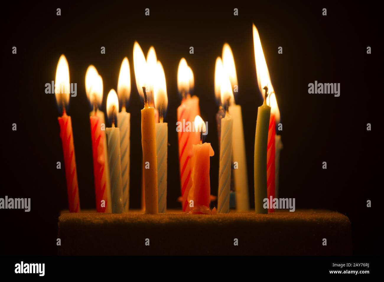 Small candles lit Stock Photo - Alamy