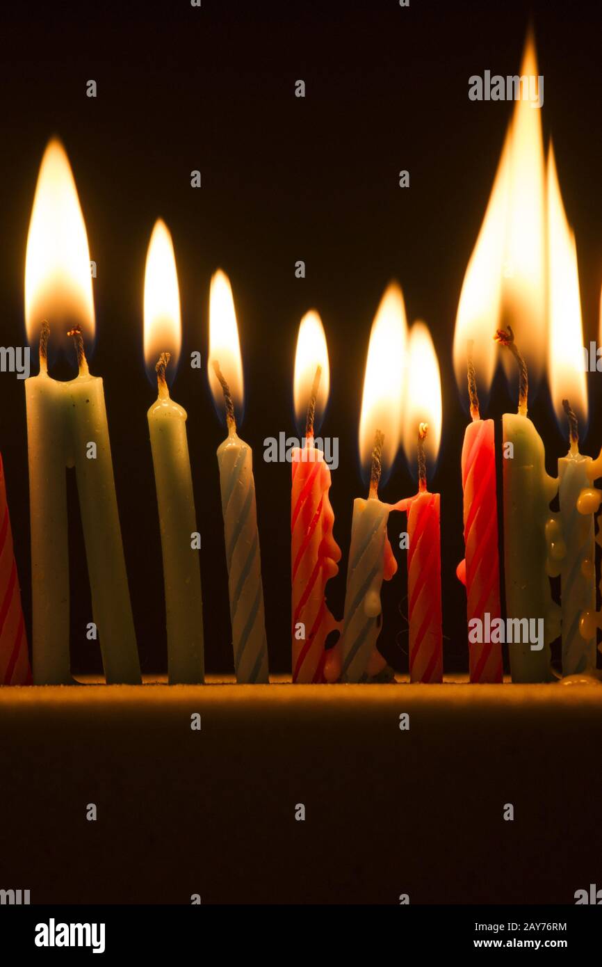 Small candles lit Stock Photo - Alamy