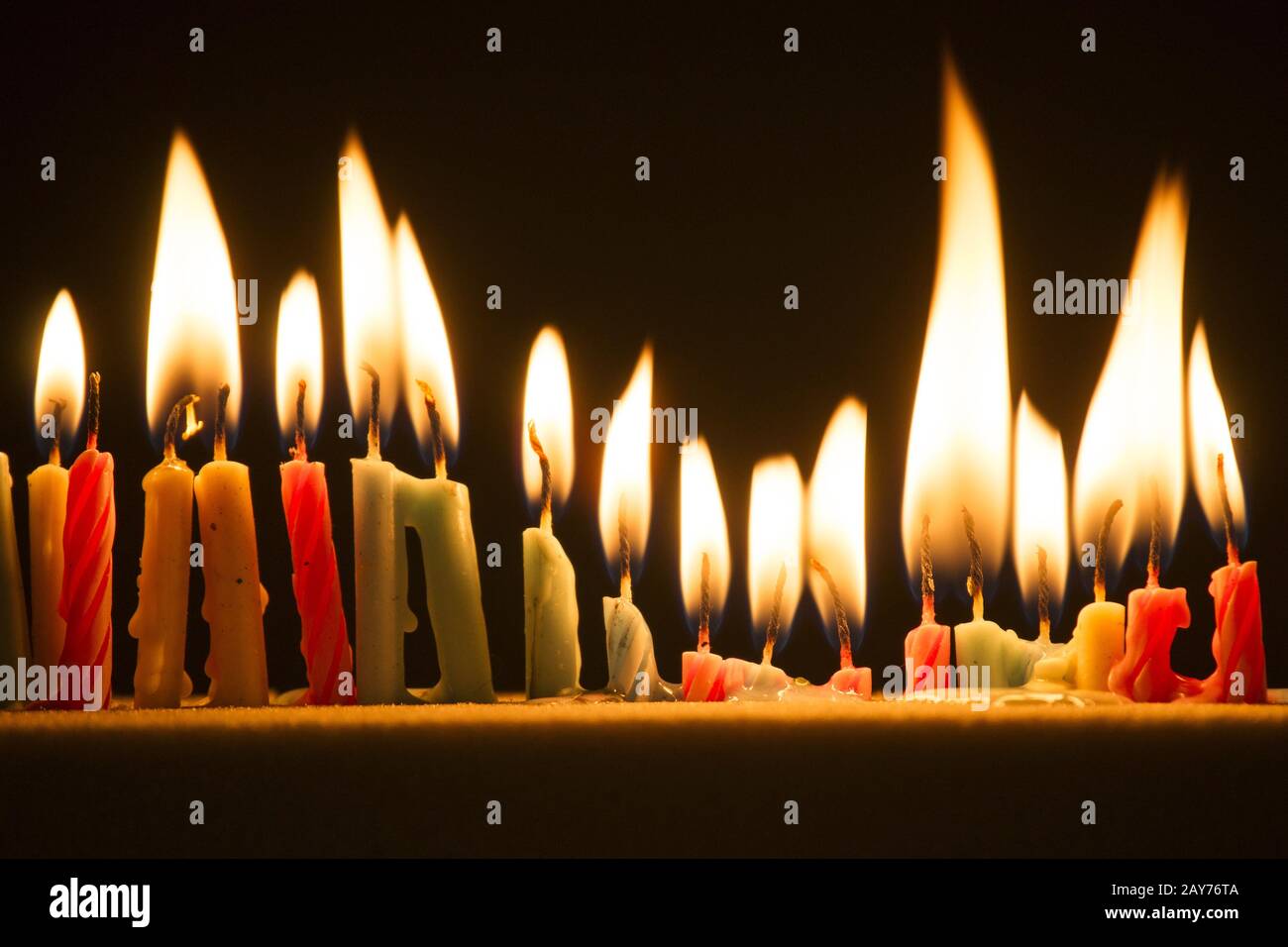 Small candles lit Stock Photo - Alamy