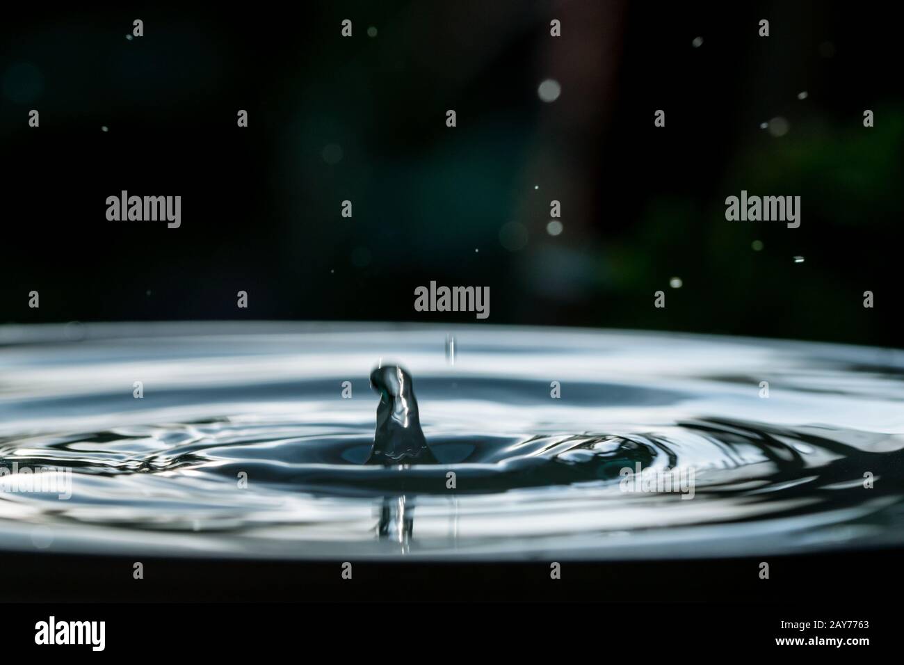 Water Drop splash with sun Stock Photo - Alamy