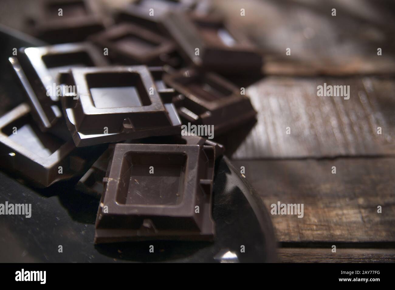Cubes of dark chocolate Stock Photo - Alamy