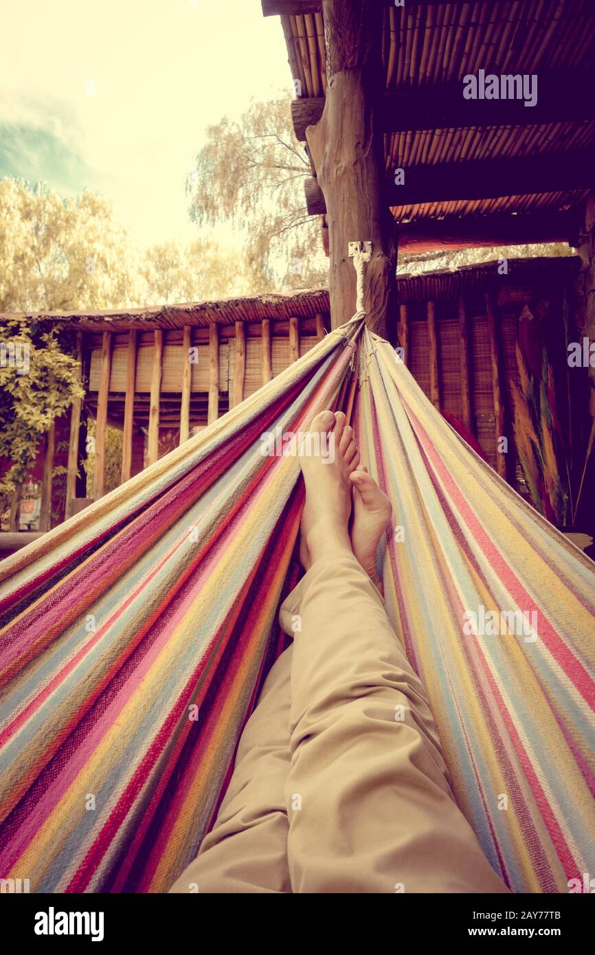 Relaxing in hammock Stock Photo - Alamy