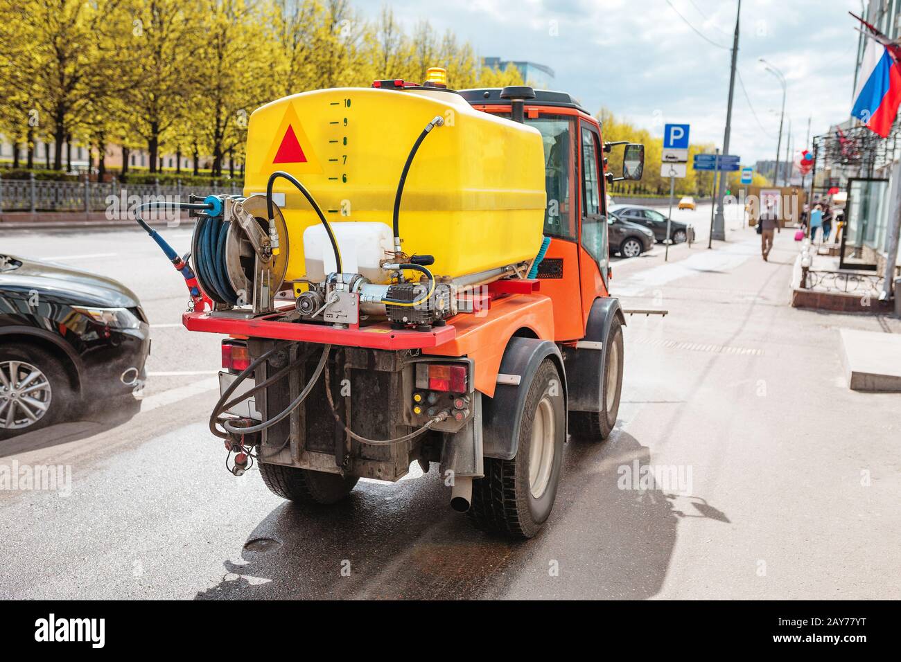 sweeper car working at the city street Stock Photo - Alamy