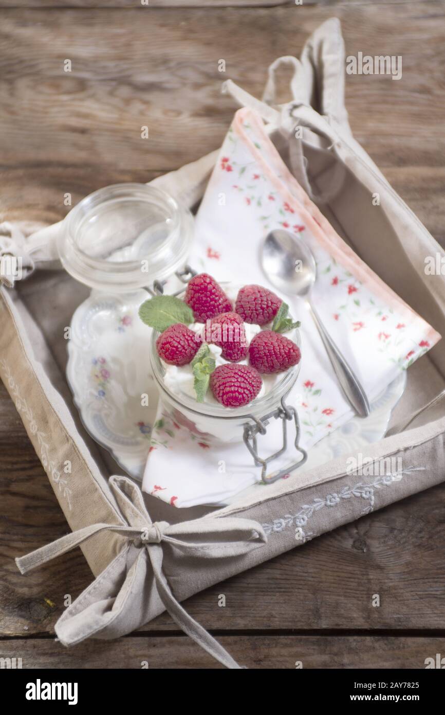Yogurt and raspberries Stock Photo - Alamy