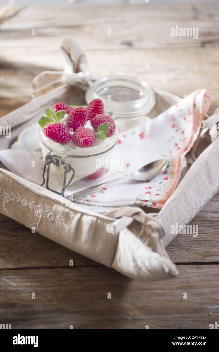 Yogurt and raspberries Stock Photo - Alamy