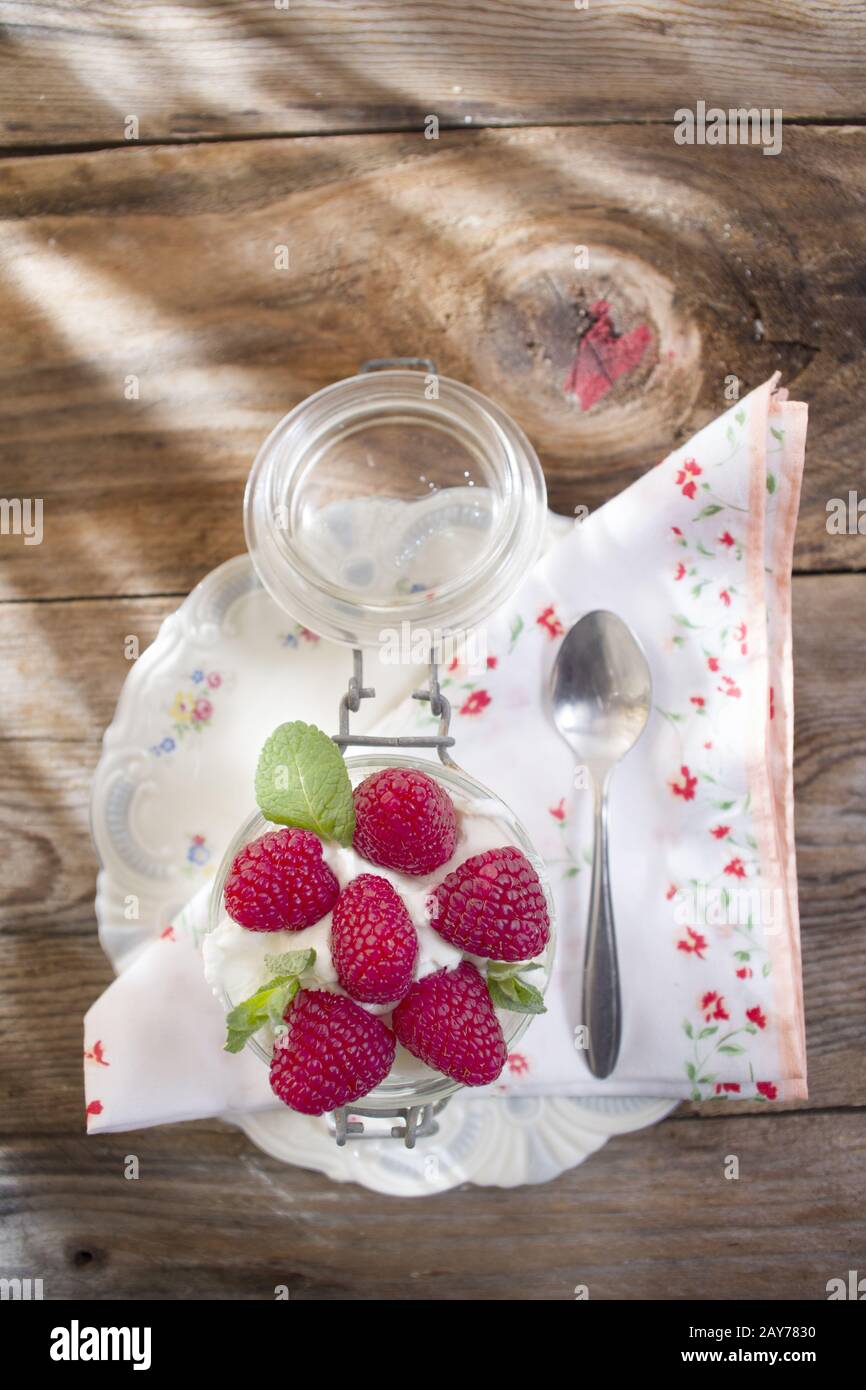 Yogurt and raspberries Stock Photo - Alamy