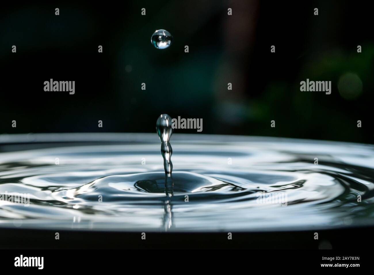 Water Drop splash with sun Stock Photo - Alamy