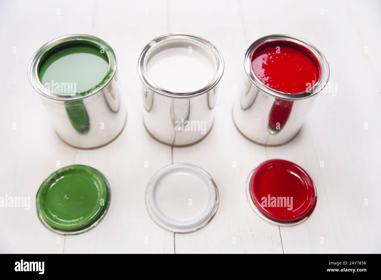 Three paint cans Stock Photo - Alamy