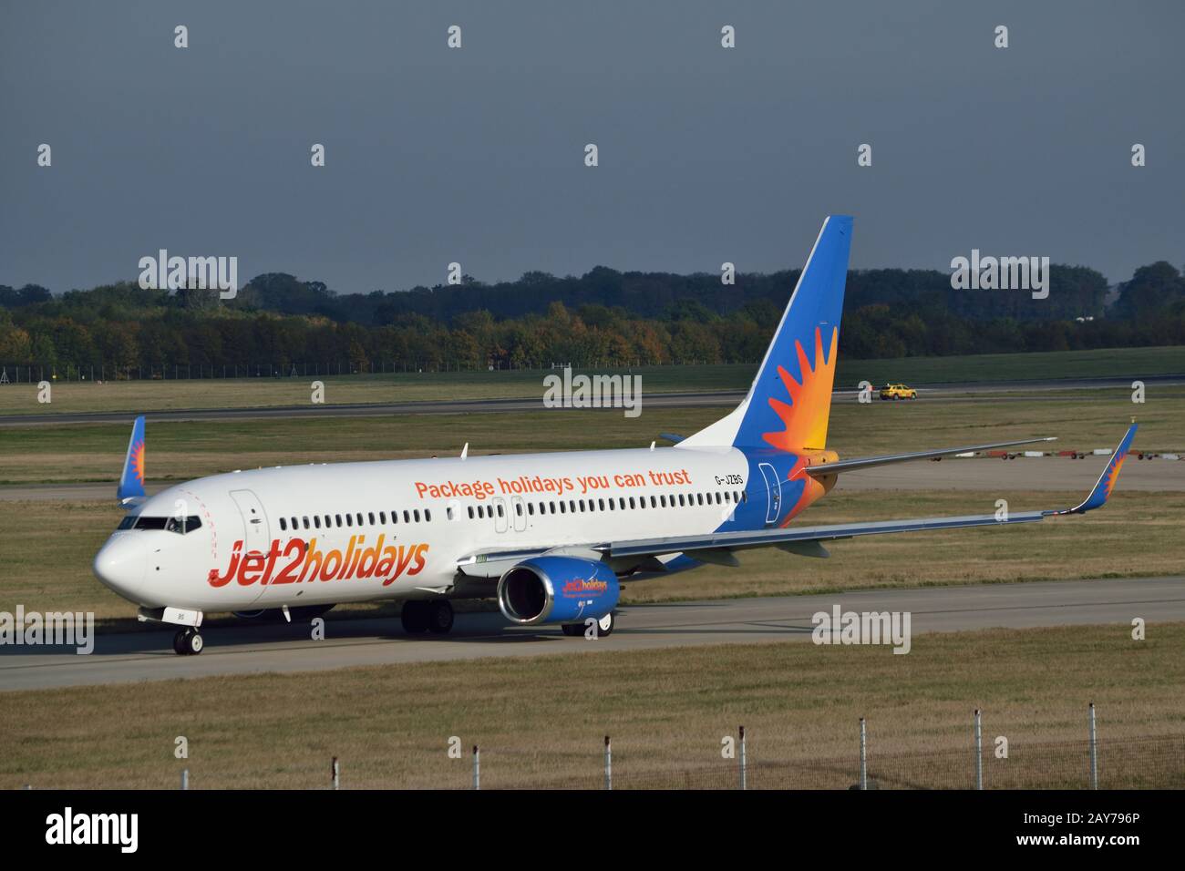 A Jet2 B737NG in the Jet2 Holidays livery heads to the runway at London ...