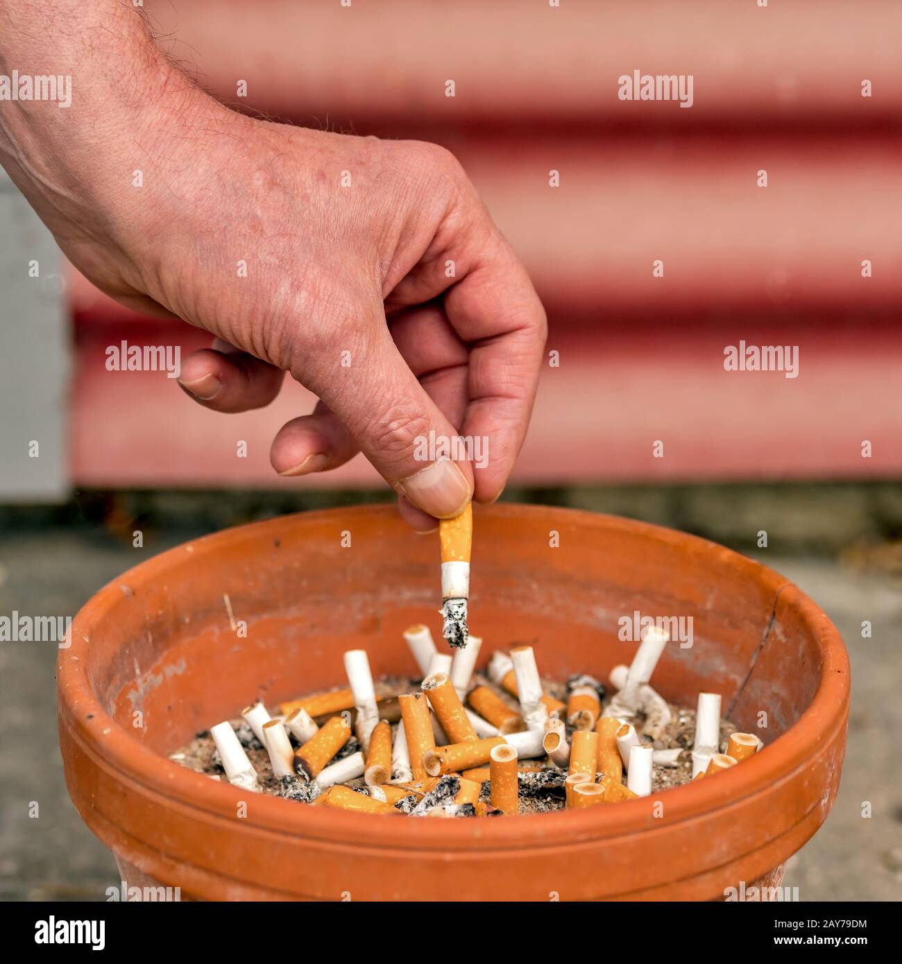 Cigarette is expressed in an ashtray Stock Photo - Alamy