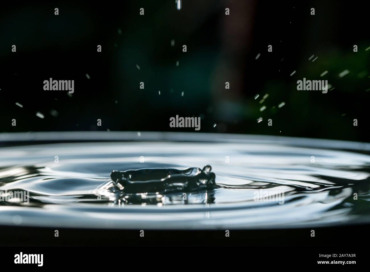 Water Drop splash with sun Stock Photo - Alamy