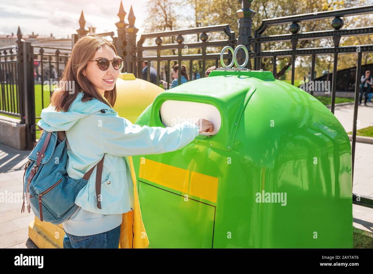 Person throwing trash street hi-res stock photography and images - Alamy