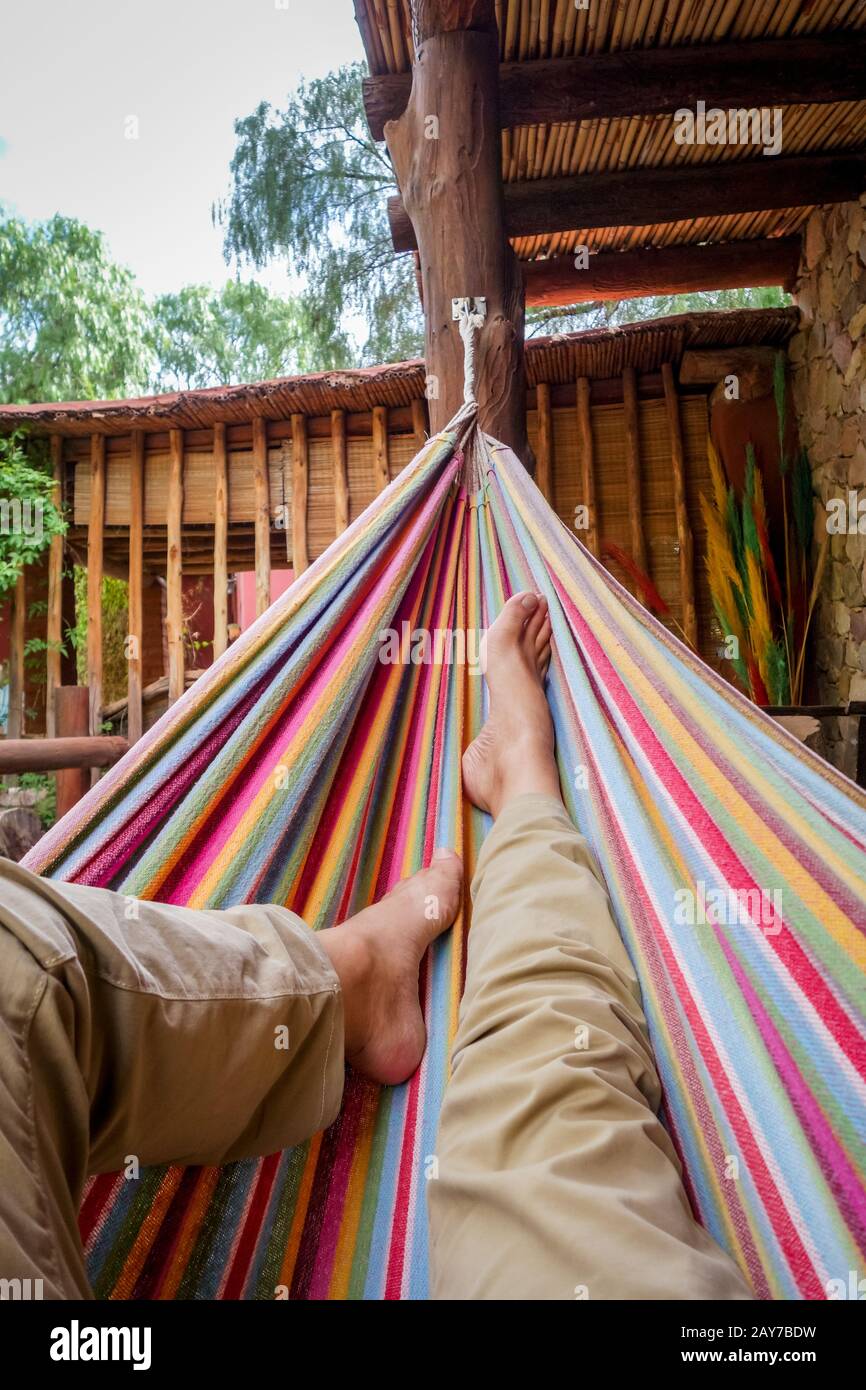 Person relaxing on hammock hi-res stock photography and images - Alamy