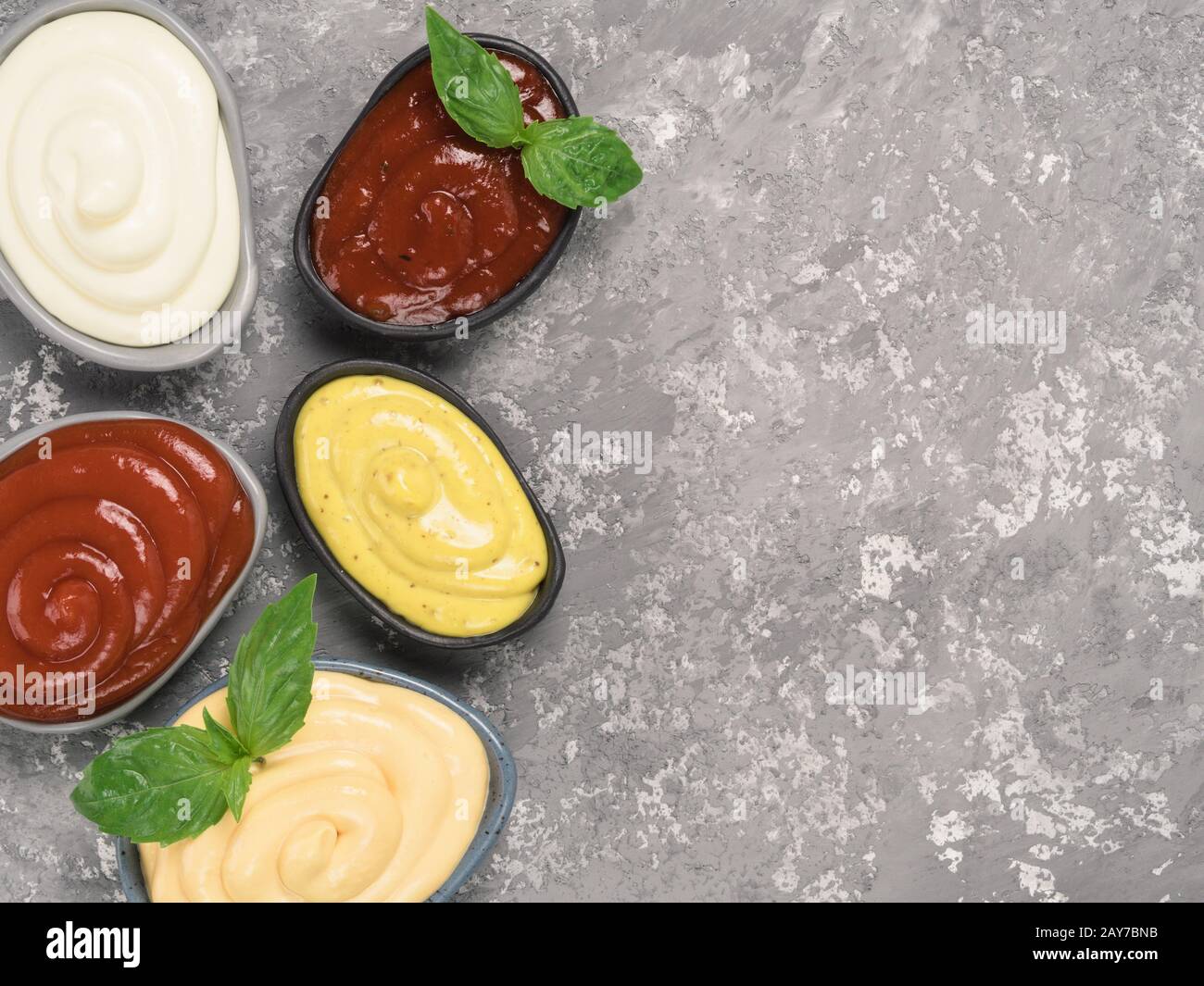 classic sauces set on gray background Stock Photo - Alamy