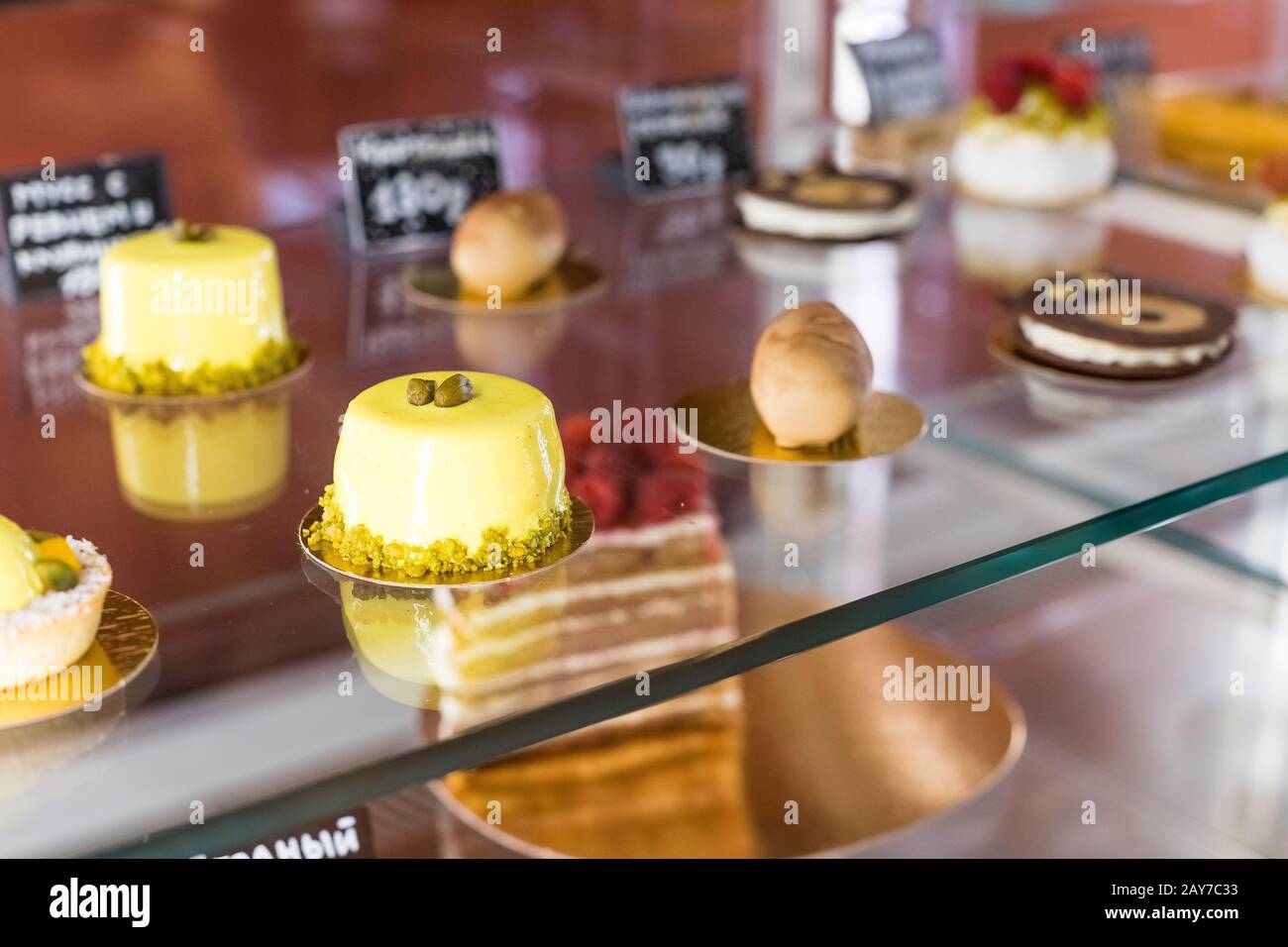 Colorful showcase of cafeteria with a tray of shortbread cookies, a ...