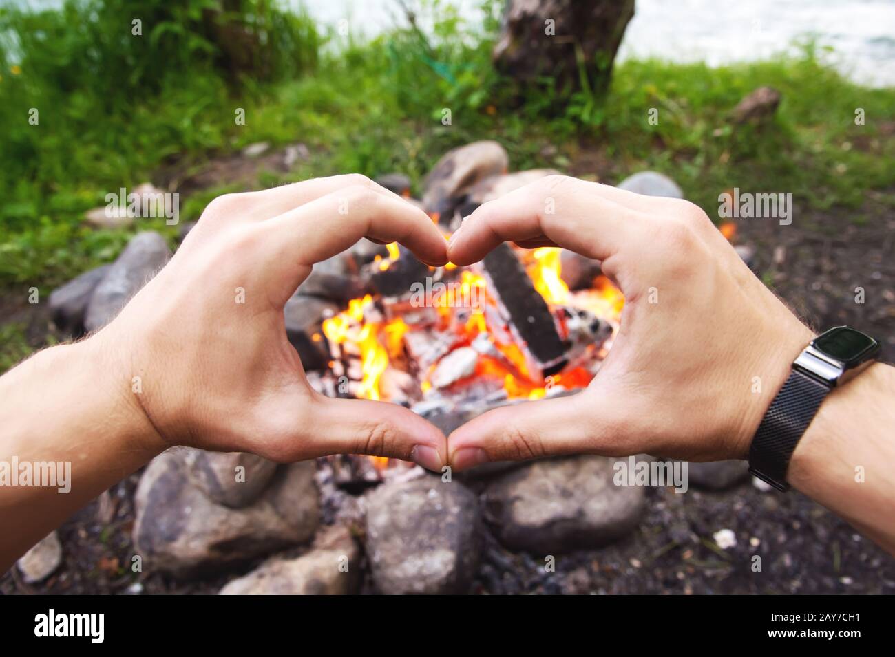 Warming hands fire hi-res stock photography and images - Alamy