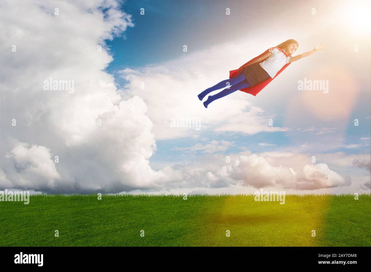 Superhero kid flying in dream concept Stock Photo - Alamy
