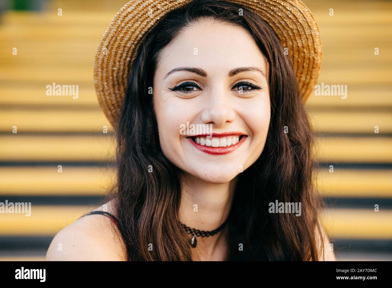 Young Brunette Woman With Dark Shining Eyes Well Shaped Lips And Broad
