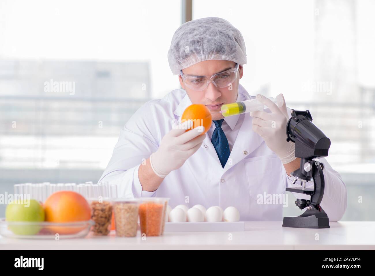 Nutrition expert testing food products in lab Stock Photo - Alamy