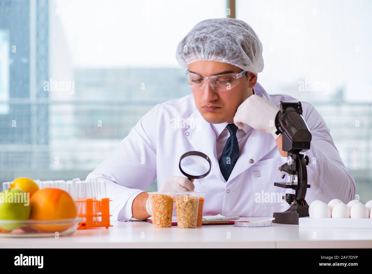 Nutrition expert testing food products in lab Stock Photo - Alamy
